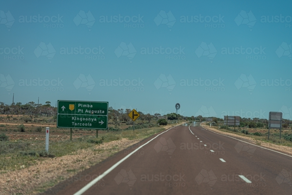 Image of Stuart Highway approaching Pimba, South Australia - Austockphoto