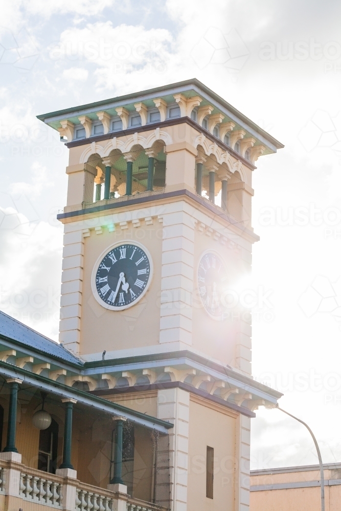 Image of Sun flare around old clock tower architecture in Maitland, NSW ...
