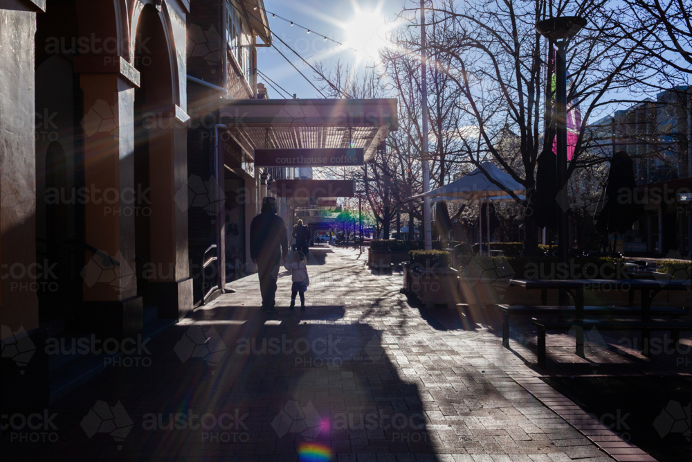 Image of sun flare over streetscape on winter day in Armidale a ...