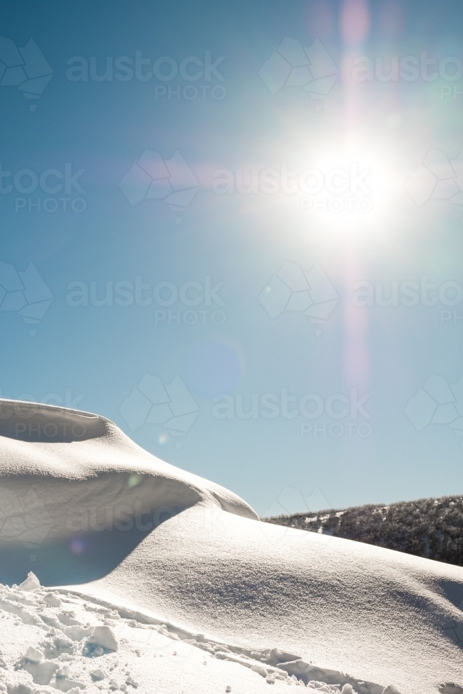 Image of Sun shine and snow in the morning. - Austockphoto