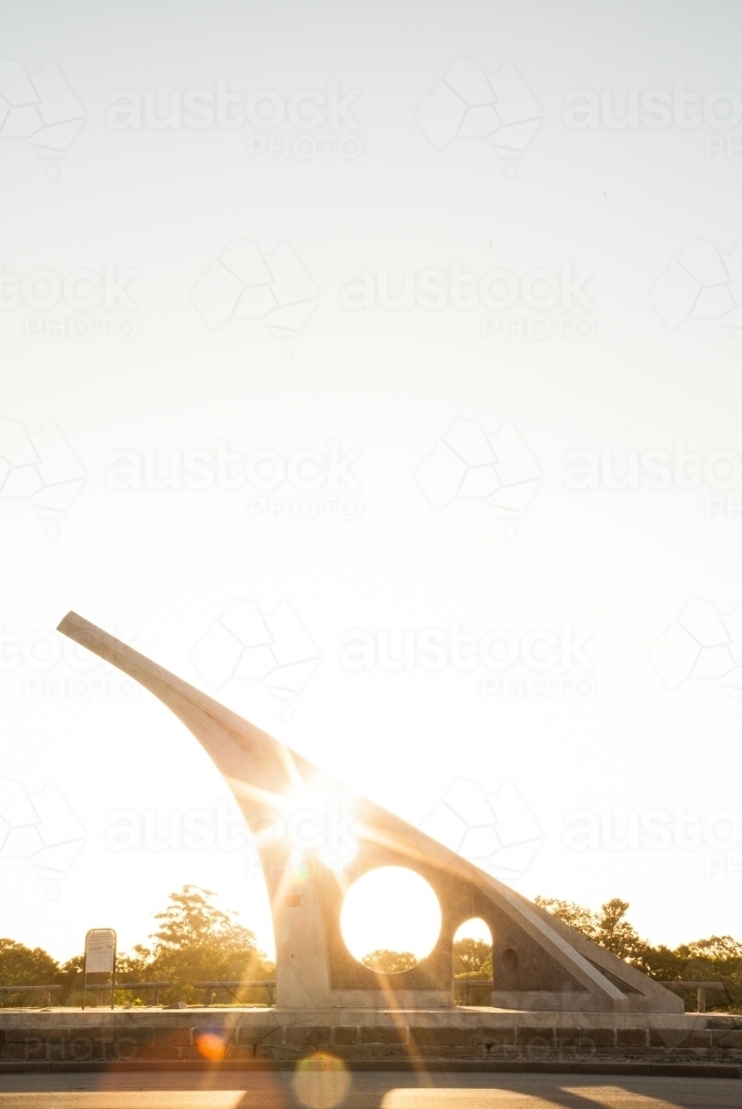 Image of Sun star shining through largest sundial in australia ...
