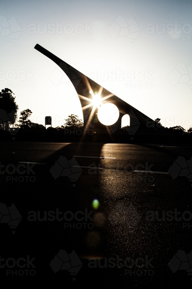 Image of Sun star shining through largest sundial in australia ...