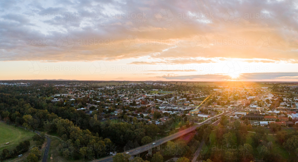 Image of Sunlight shining from sun on horizon over Dubbo city in the ...