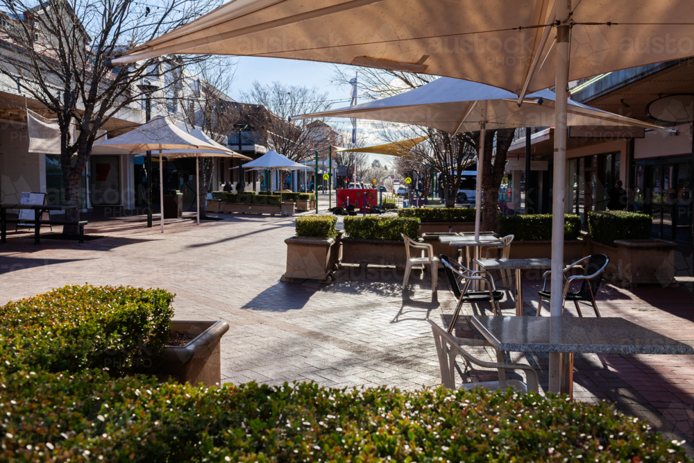Image of Sunlit Armidale streetscape with shade umbrellas for cafe ...