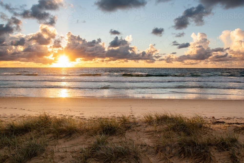 Image of Sunrise on the eastern beach of Moreton Island - Austockphoto