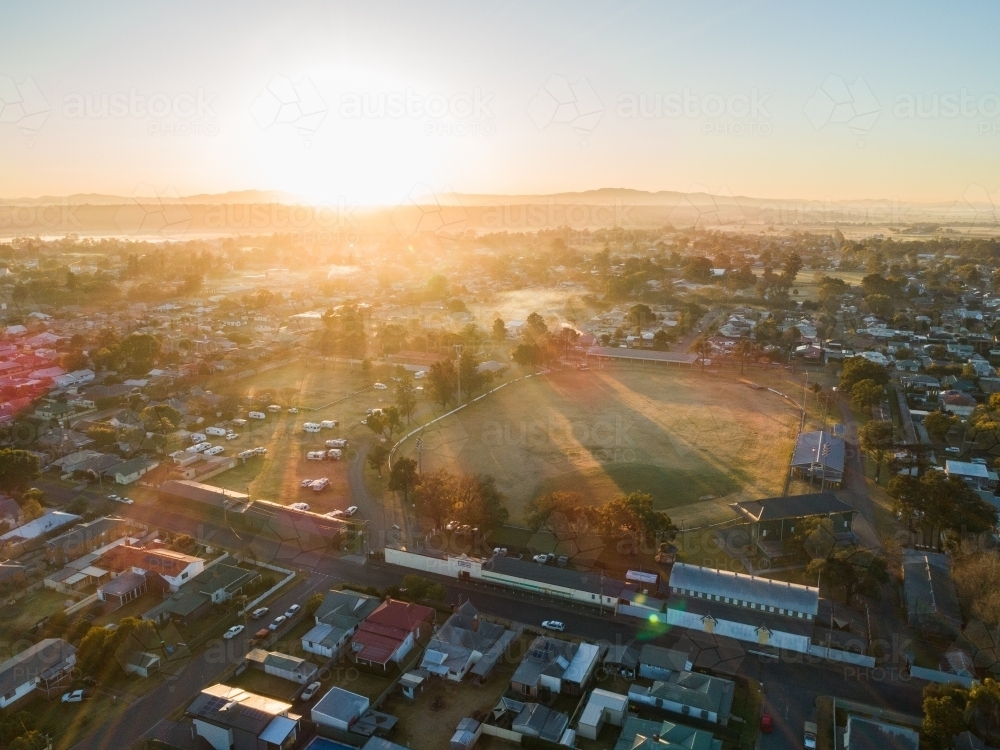 Image of Sunrise over showground caravan park area in country town of ...