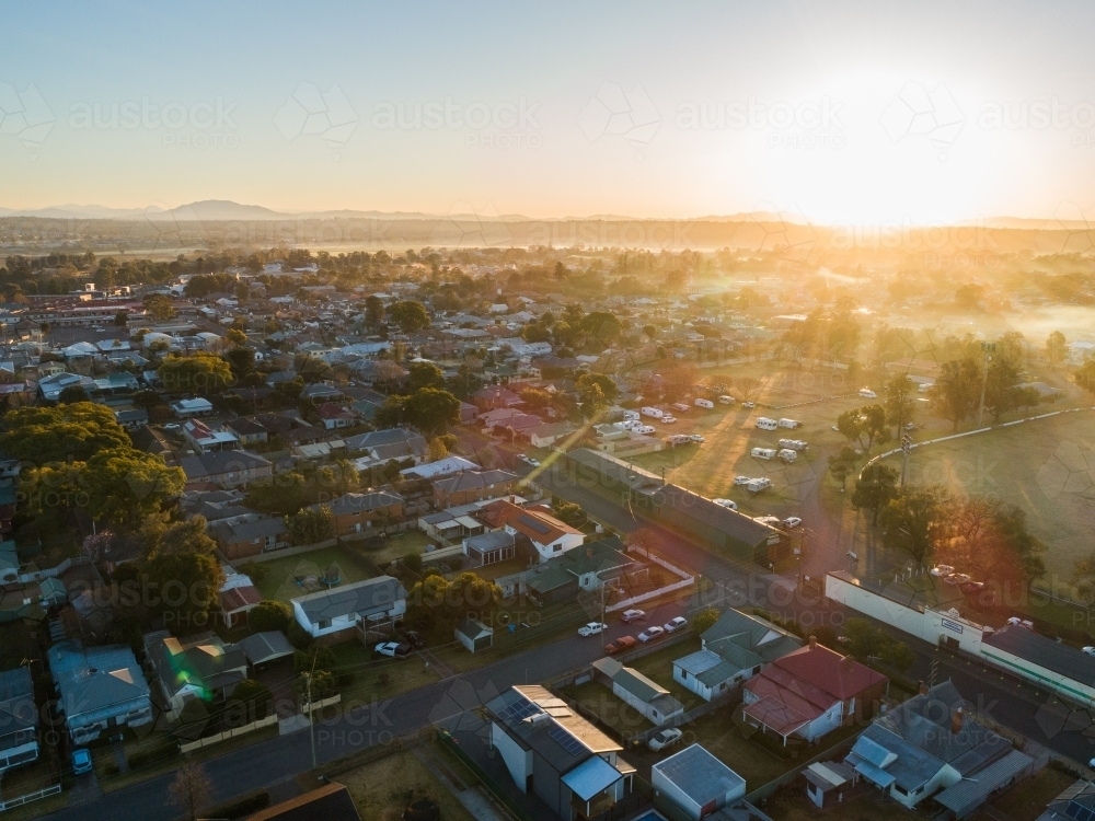Image of Sunrise over showground caravan park area in country town of ...