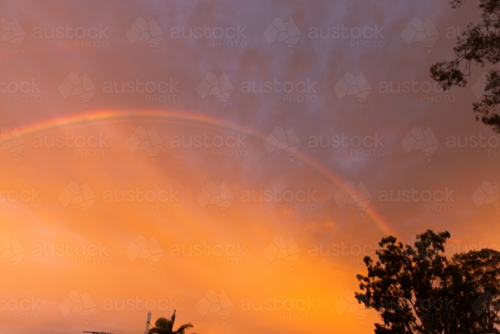 Image of sunset rainbow - Austockphoto