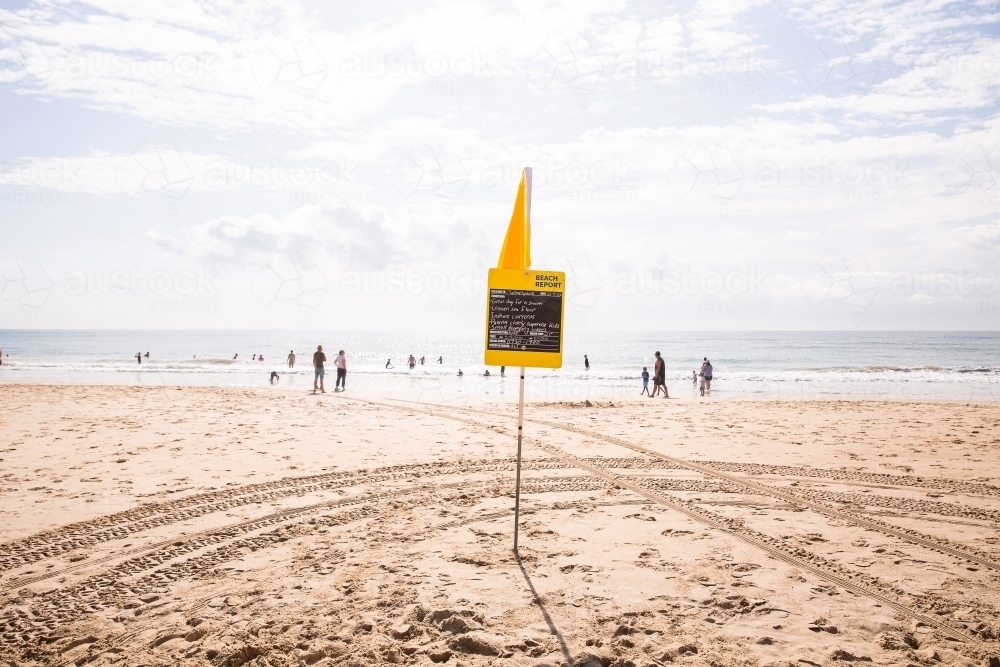Image of surf safety sign on beach - Austockphoto