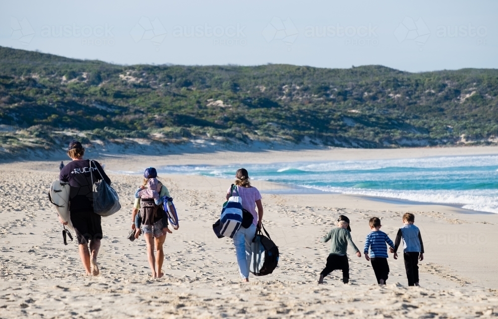 Image of Surfing Families walking along Surf beach with boards and ...