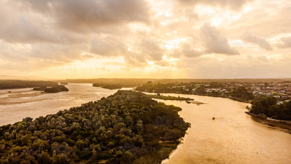 Image of sweeping aerial view of river winding through green wilderness ...