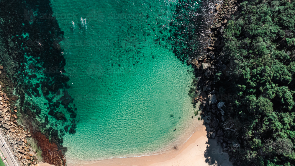 Image of swimmers on aerial View of Coastal Cove with Clear Turquoise ...