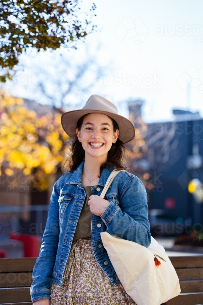 Image of Teenaged Aussie girl walking downtown on main street of ...