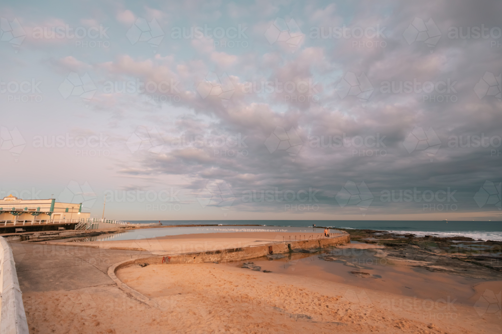 Image of The Canoe Pool at Newcastle Beach at sunset - Austockphoto