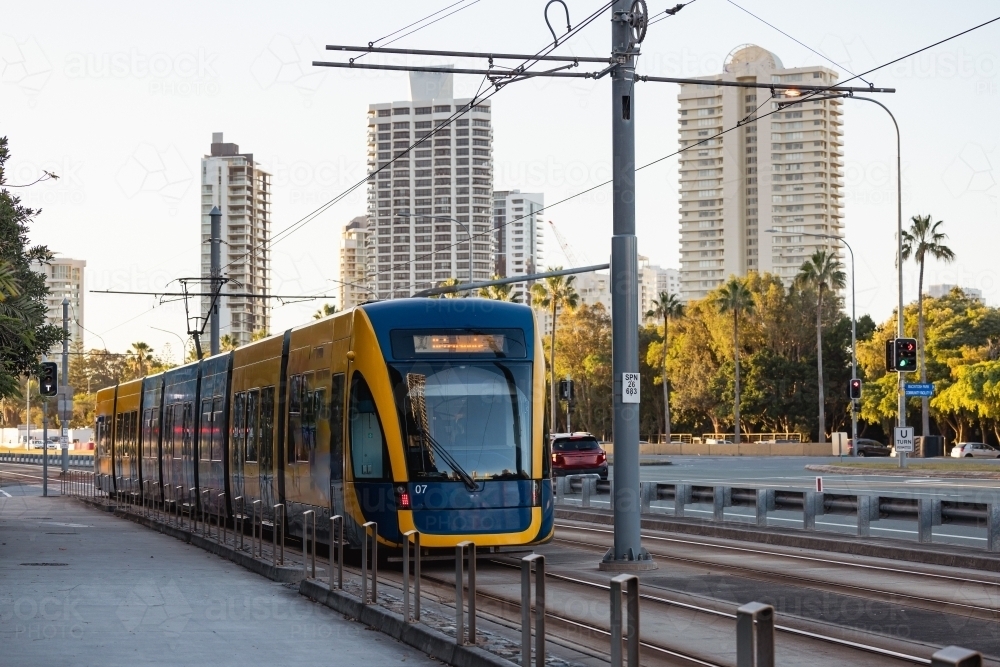 Image of The G:link light rail tram on the Gold Coast passing station ...