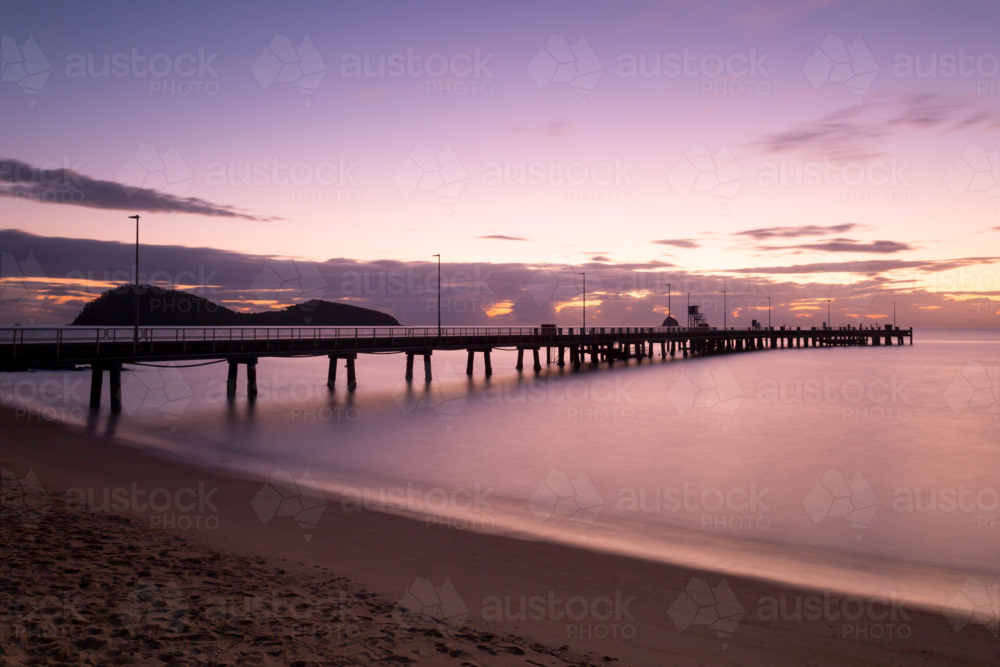 Image of The iconic Palm Cove jetty and boat ramp at sunrise on a ...