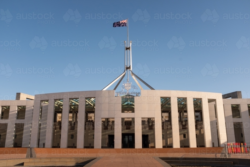 Image of the new Australian Parliament House in Canberra Australia at sunset - Austockphoto
