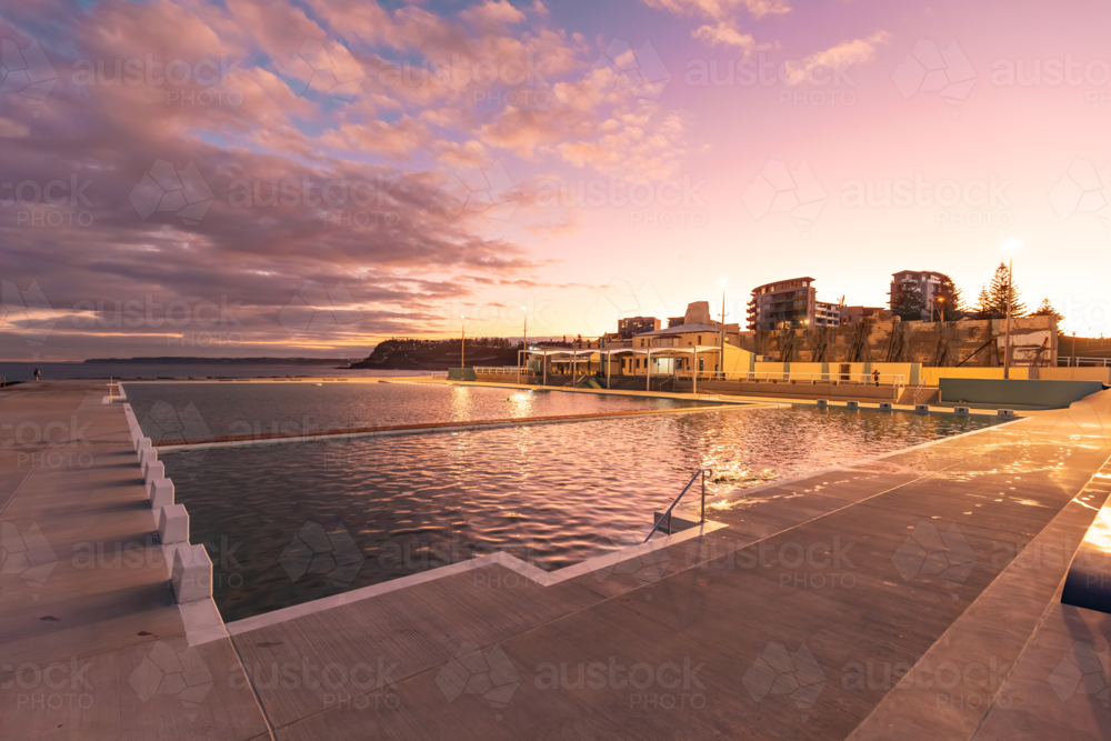 Image of The Newcastle Ocean Baths at dusk with pink and purple fairy ...
