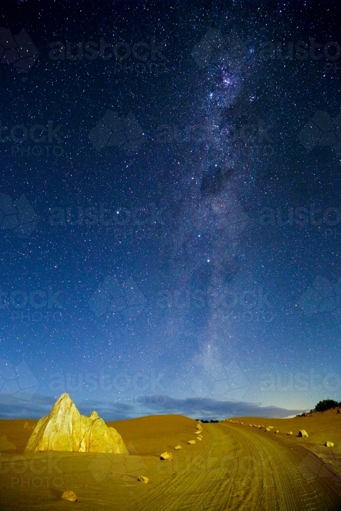 Image of The Pinnacles Western Australia with stars at night - Austockphoto