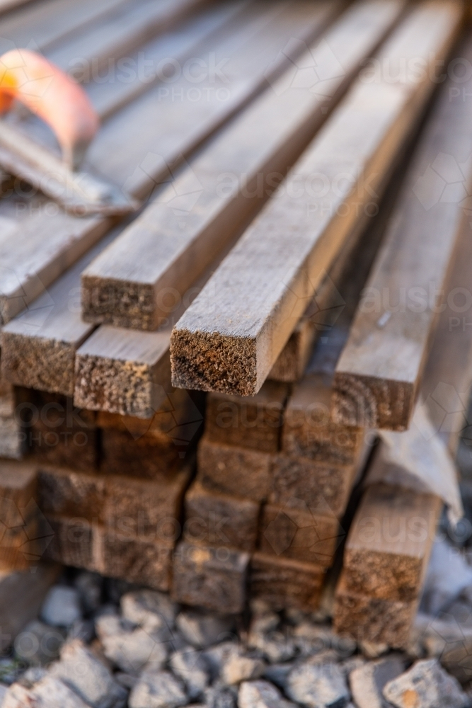 Image of timber pieces stacked on a building site - Austockphoto