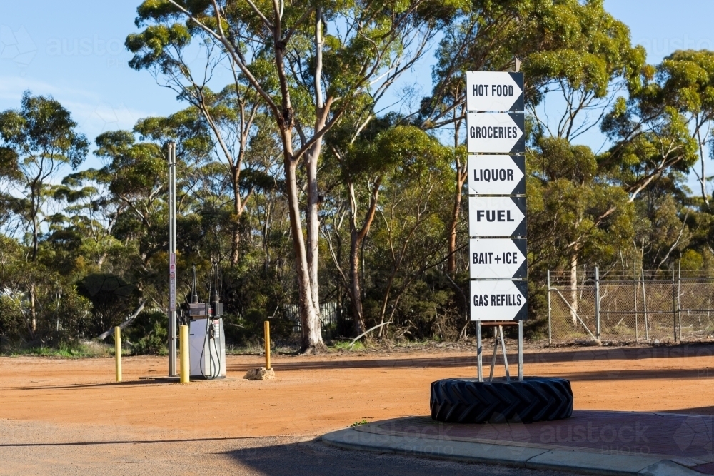 Image of Tiny fuel station in the outback, with sign for supplies ...