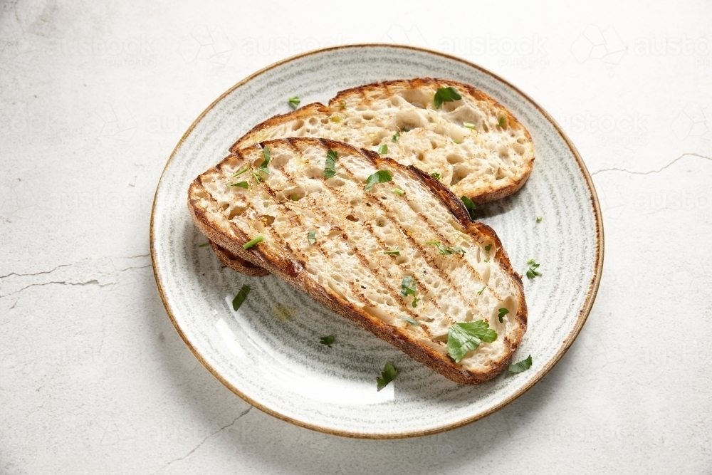 Image of Toast on plate - Austockphoto