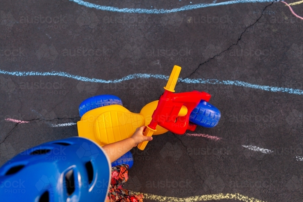 Image of Toddlers tricycle on driveway with chalk bike track drawn on ...