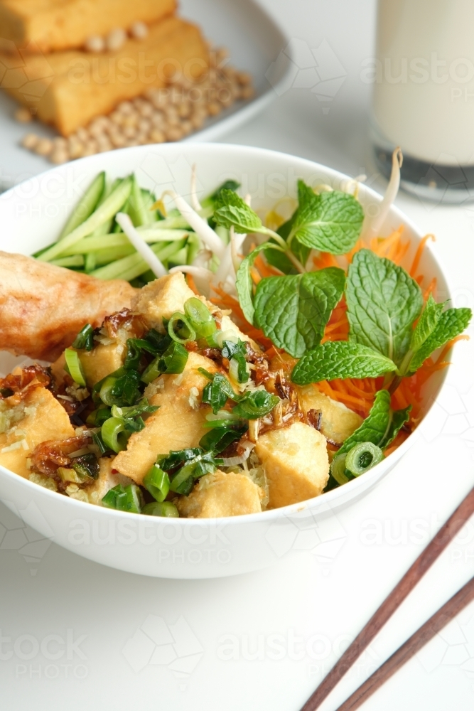 Image of Tofu Bun Cha Gio bowl topped with fried spring roll ...