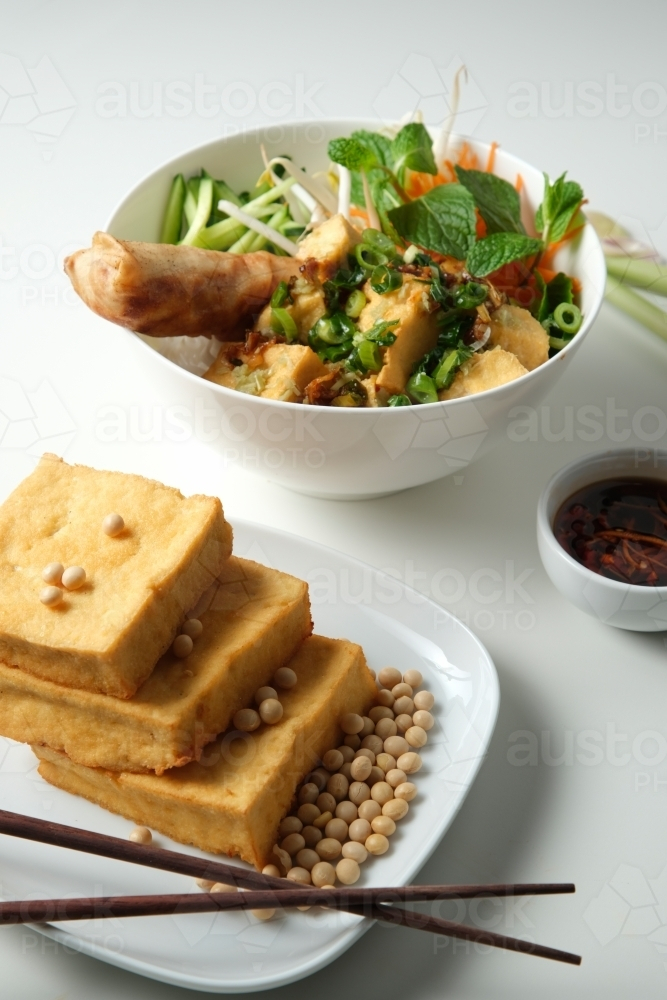 Image of Tofu Bun Cha Gio bowl topped with fried spring roll ...