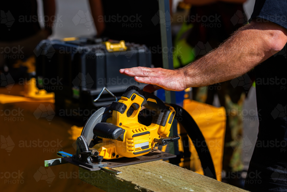 Image of tool demonstrator talking about tool safety during workshop ...