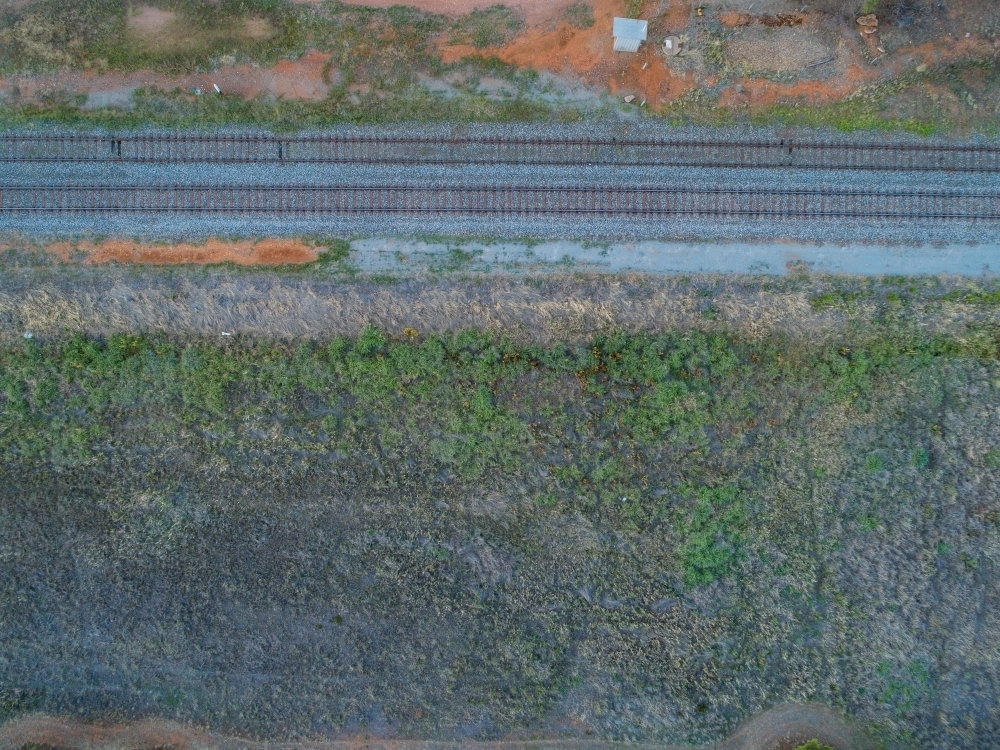 Image of Top down of train tracks from aerial perspective - Austockphoto