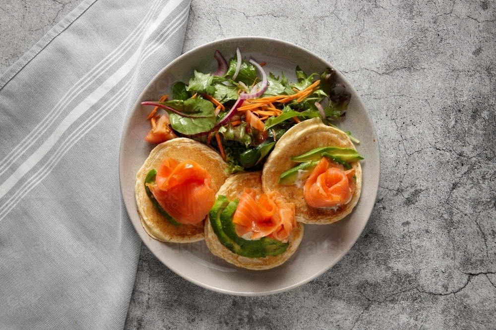 Image of top shot of salmon pikelets - Austockphoto