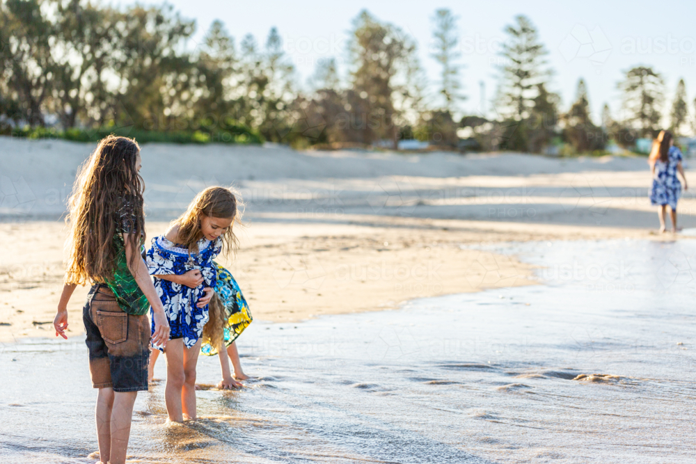Image of Torres Strait Islander children playing together on shoreline ...