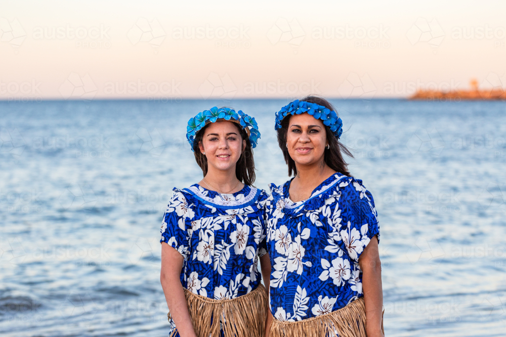 Image of Torres Strait Islander mum with teenaged daughter standing by ...