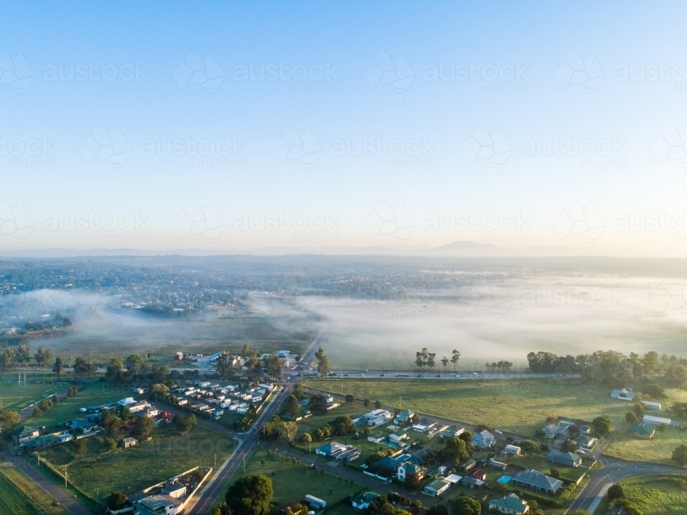 Image of Traffic lights intersection of highway through Singleton with ...