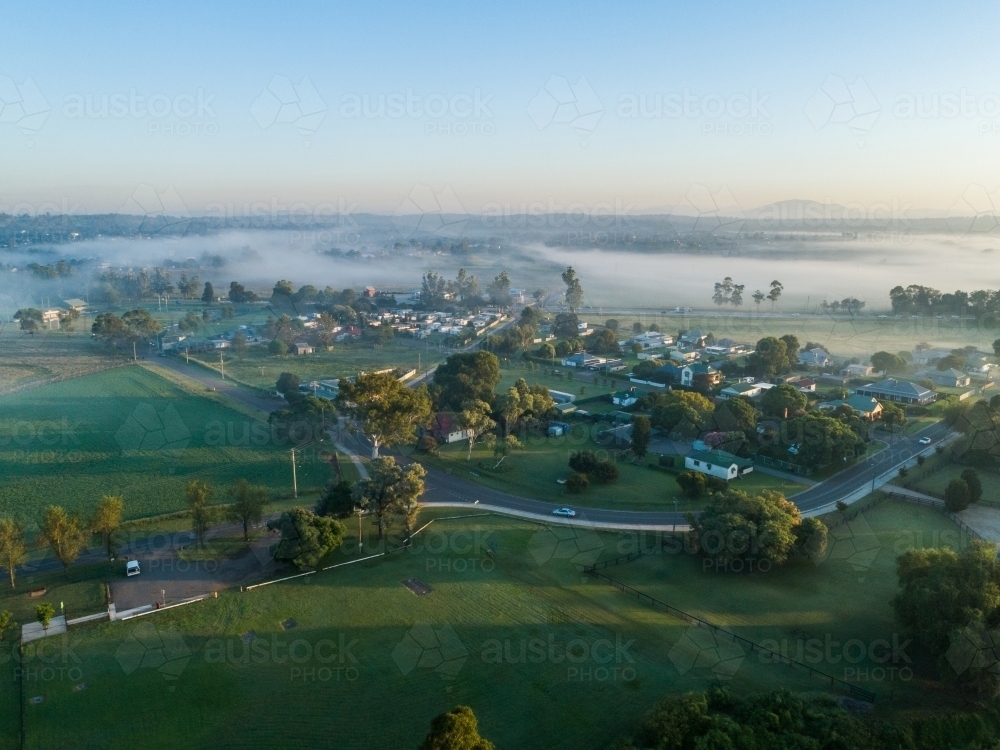 Image of Traffic lights intersection of highway through Singleton with ...