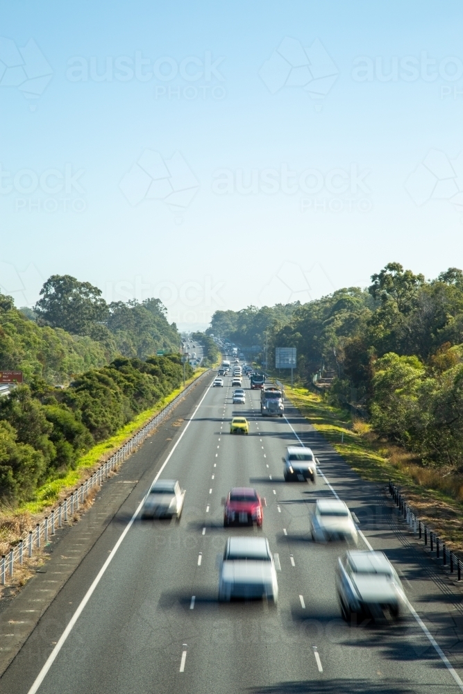 Image of Traffic moving on M1 highway, north of Brisbane - Austockphoto