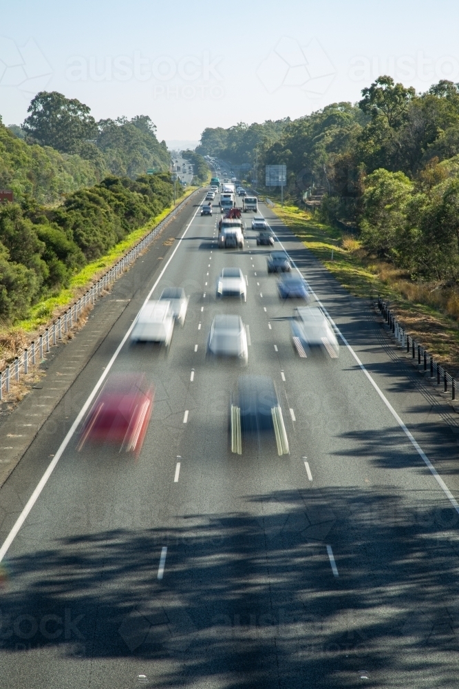 Image of Traffic moving on M1 highway, north of Brisbane - Austockphoto