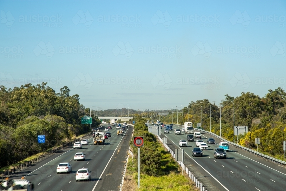 Image of Traffic moving on M1 highway, north of Brisbane - Austockphoto