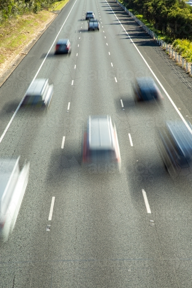 Image of Traffic moving on M1 highway, north of Brisbane - Austockphoto