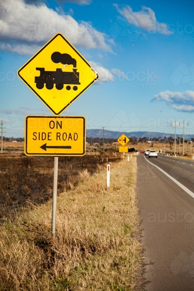 Image of Train track crossing on side road sign on rural road ...