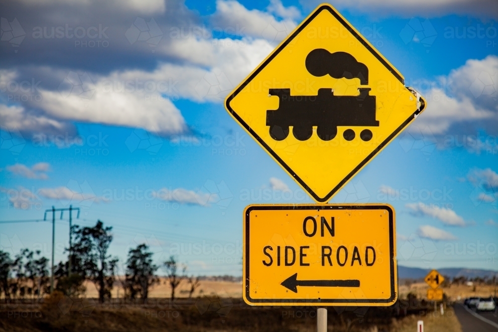 Image of Train track crossing on side road sign on rural road ...