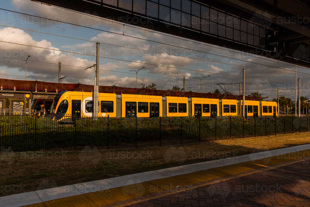 Image of tram in the late afternoon light on the Gold Coast - Austockphoto
