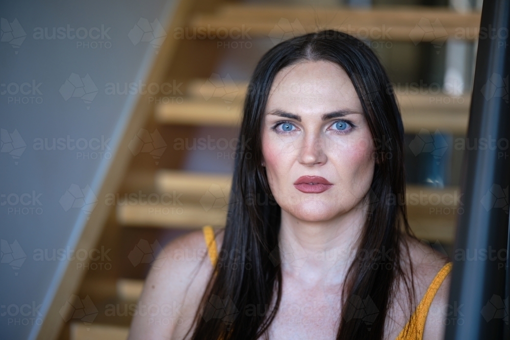 Image of Transgender woman on stairway - Austockphoto