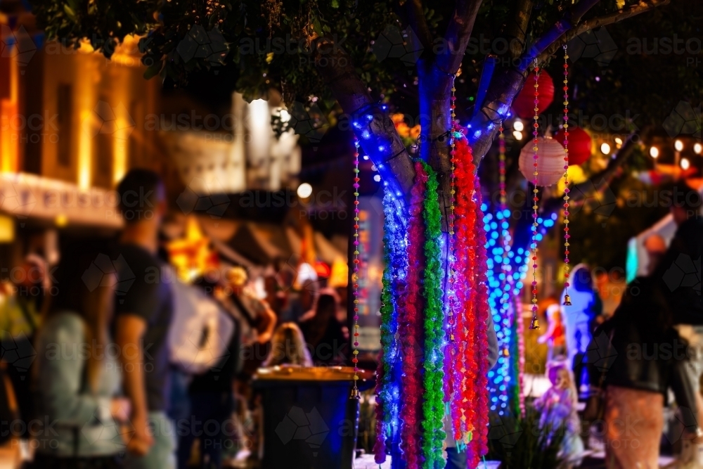 Image of Tree decorated with garlands at multicultural festival event ...