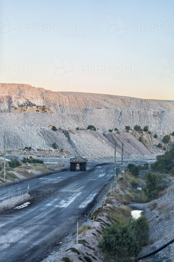 Image of Trucks working late in the day on open cut coal mining ...
