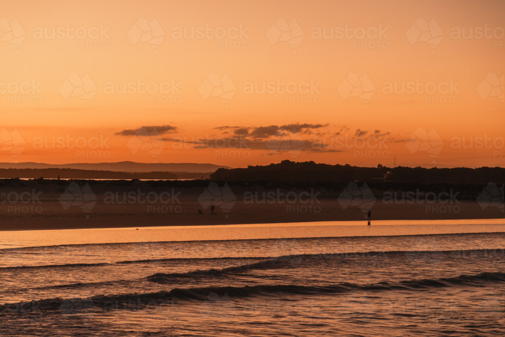 Image of Turners Beach, Yamba at sunset - Austockphoto