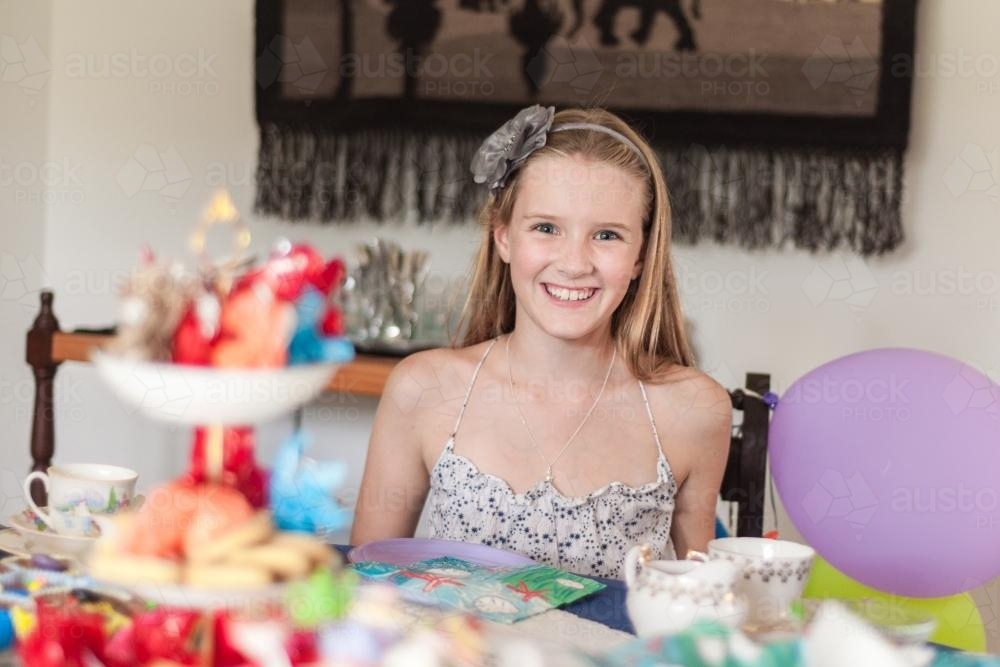 Image of tween afternoon tea birthday party - Austockphoto