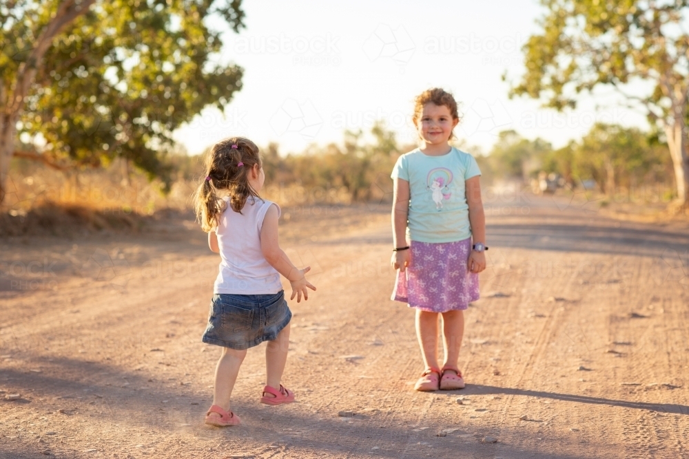 Image of Two children on an outback station - Austockphoto