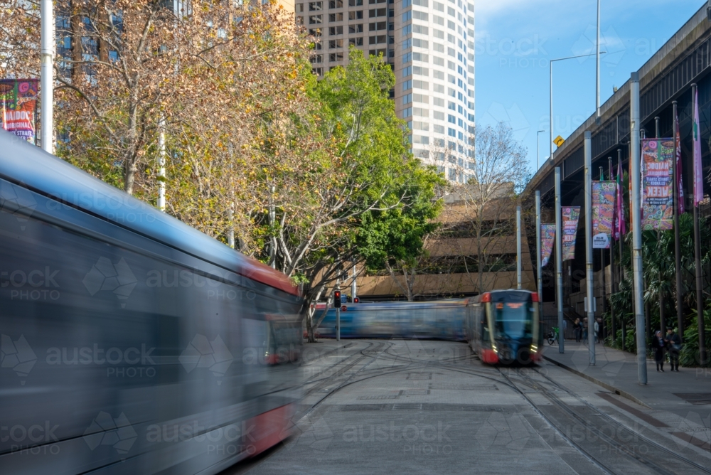 Image of Two light rail trains in Sydney at Circular Quay shot with a ...